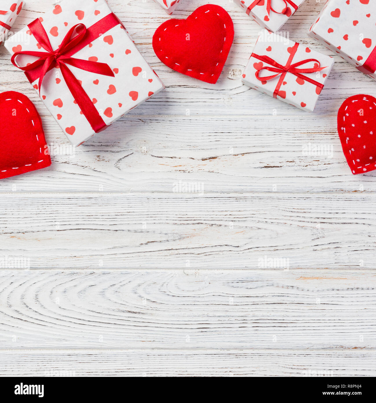 Valentine or other holiday handmade present in paper with red hearts ...