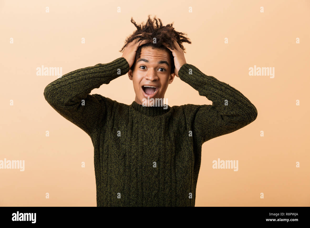 Grabbing head hi-res stock photography and images - Alamy