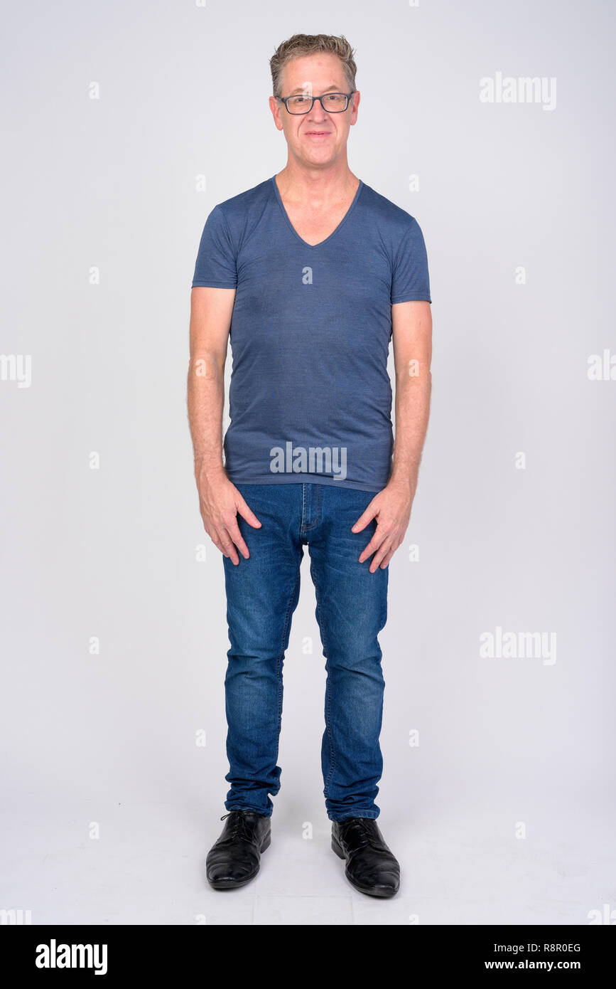 Full body shot of mature man against white background Stock Photo - Alamy