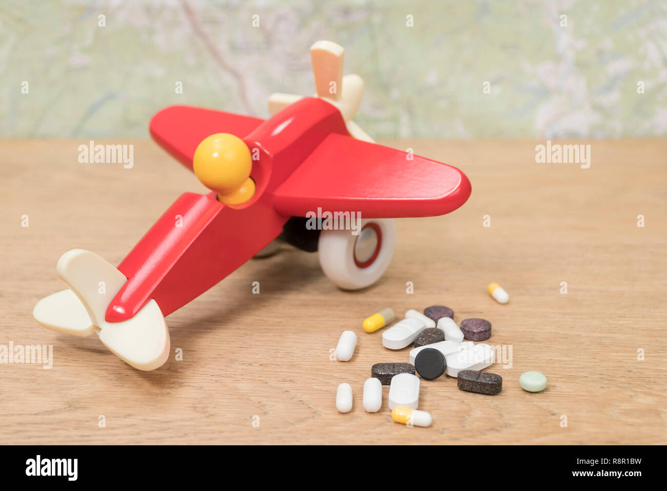Red airplane flying on map hi-res stock photography and images - Alamy