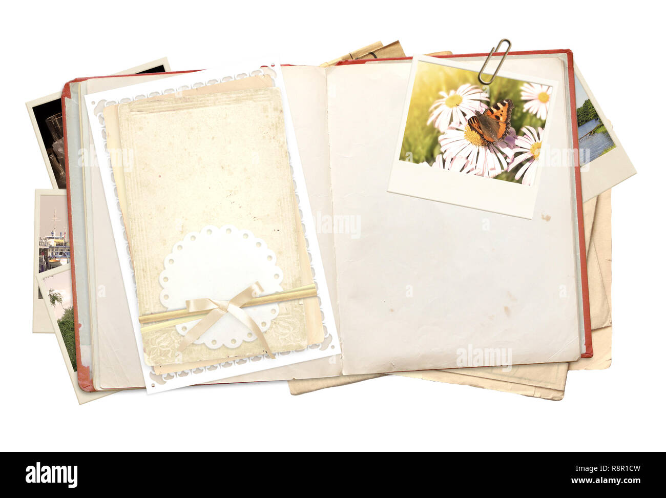 Old book and photos. Objects isolated over white Stock Photo - Alamy