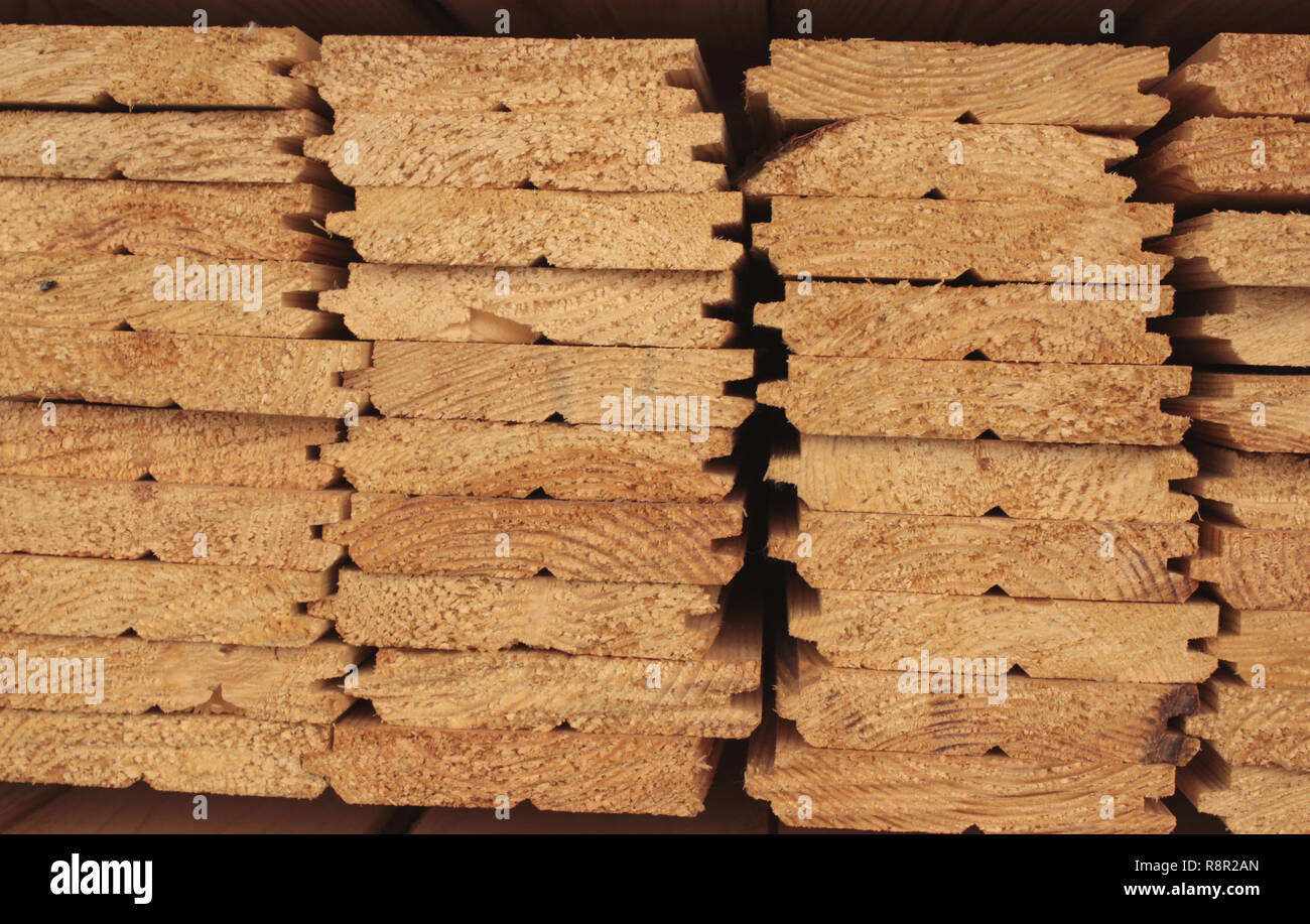 Row of boards in a building warehouse Stock Photo - Alamy