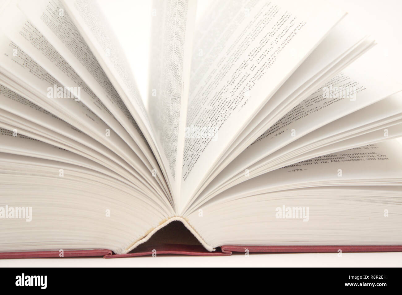 Opened book - object over white Stock Photo - Alamy