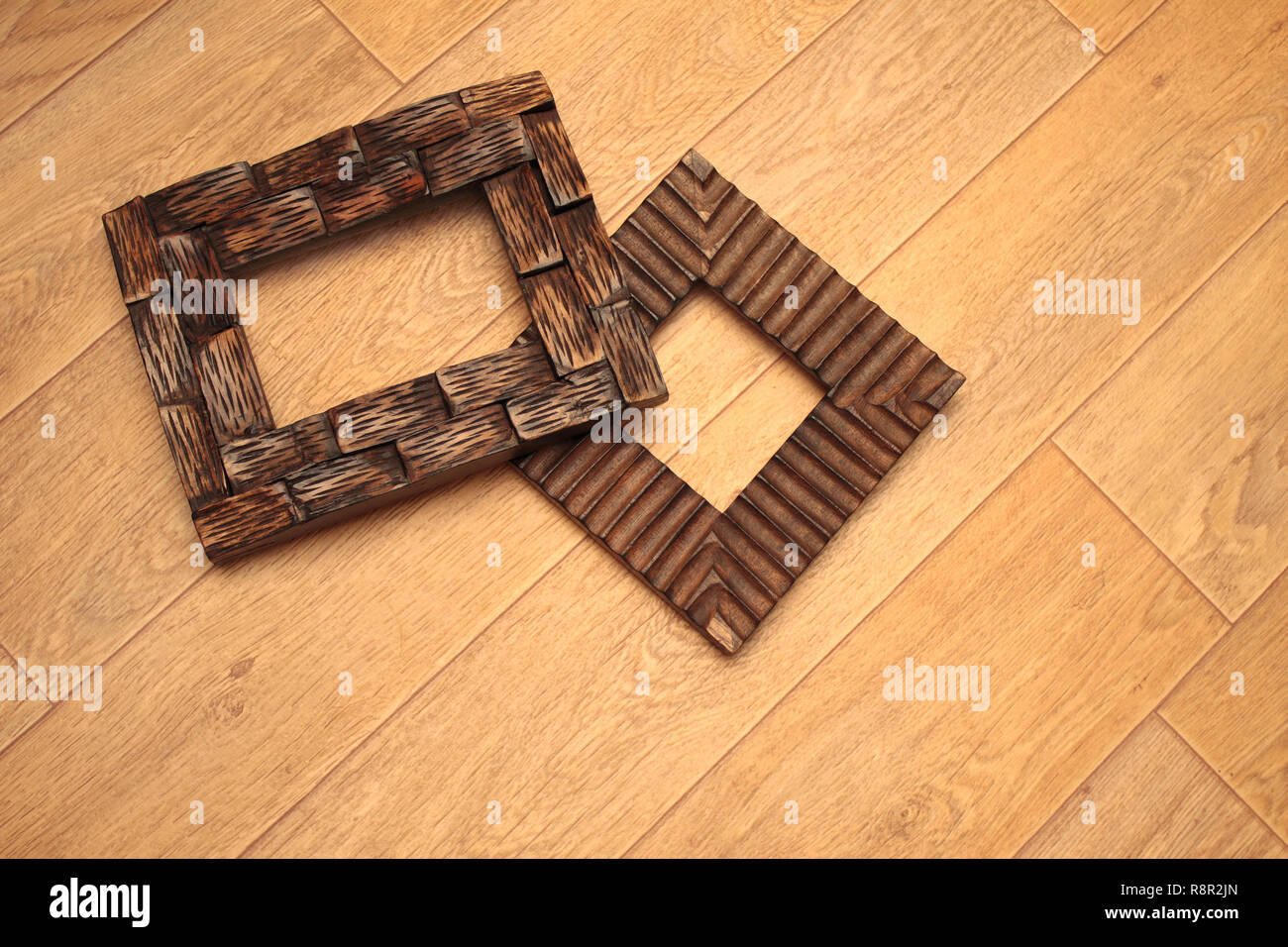 Two wooden frames laying on a floor Stock Photo - Alamy