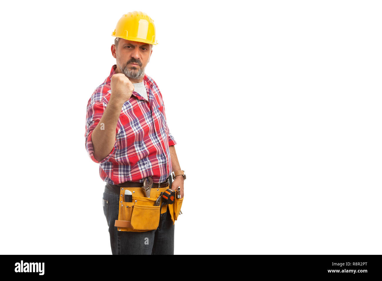 Angry aggressive builder showing fist as threatening concept isolated ...