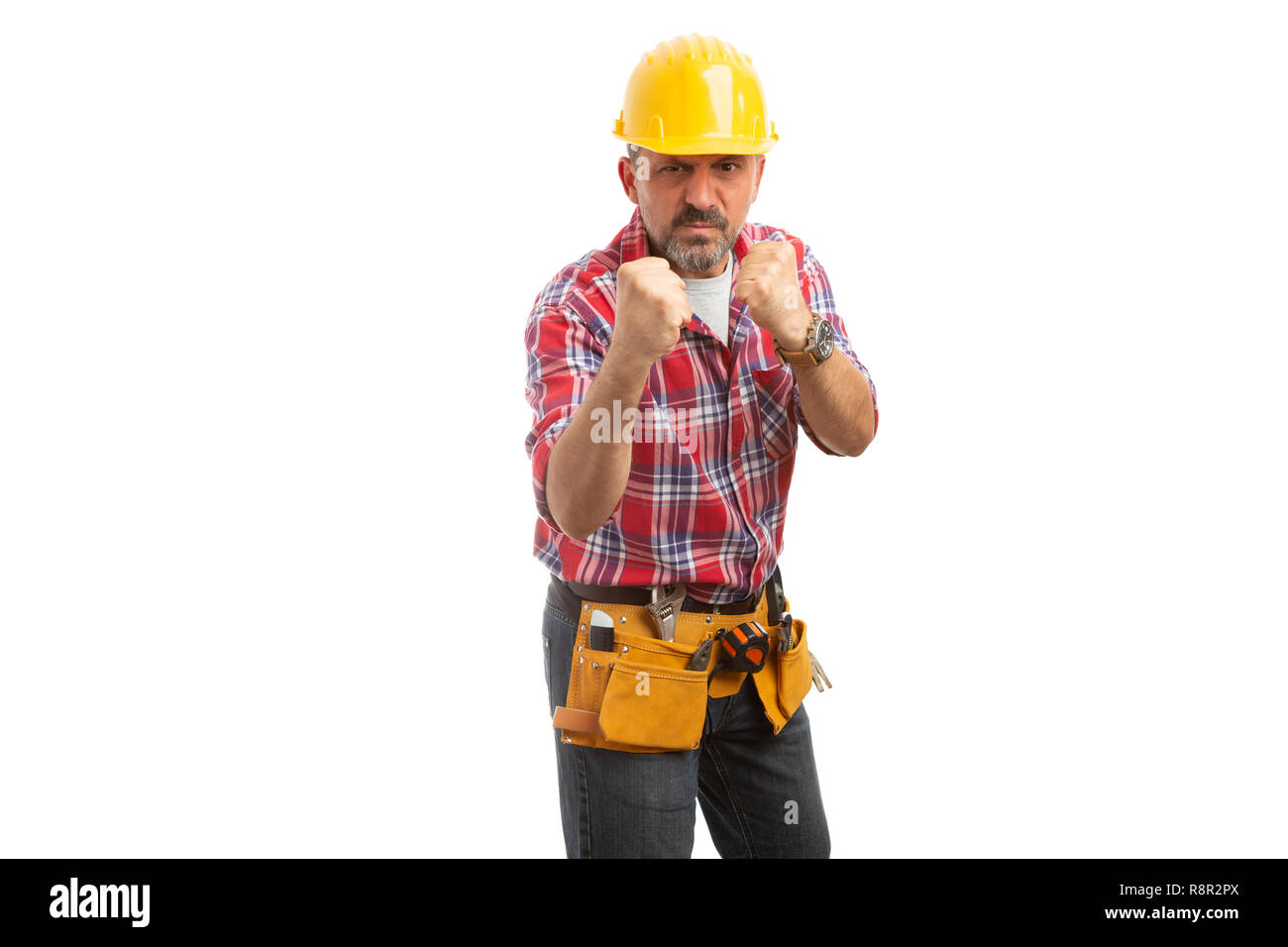 Mad builder threatening with fists ready to fight isolated on white ...