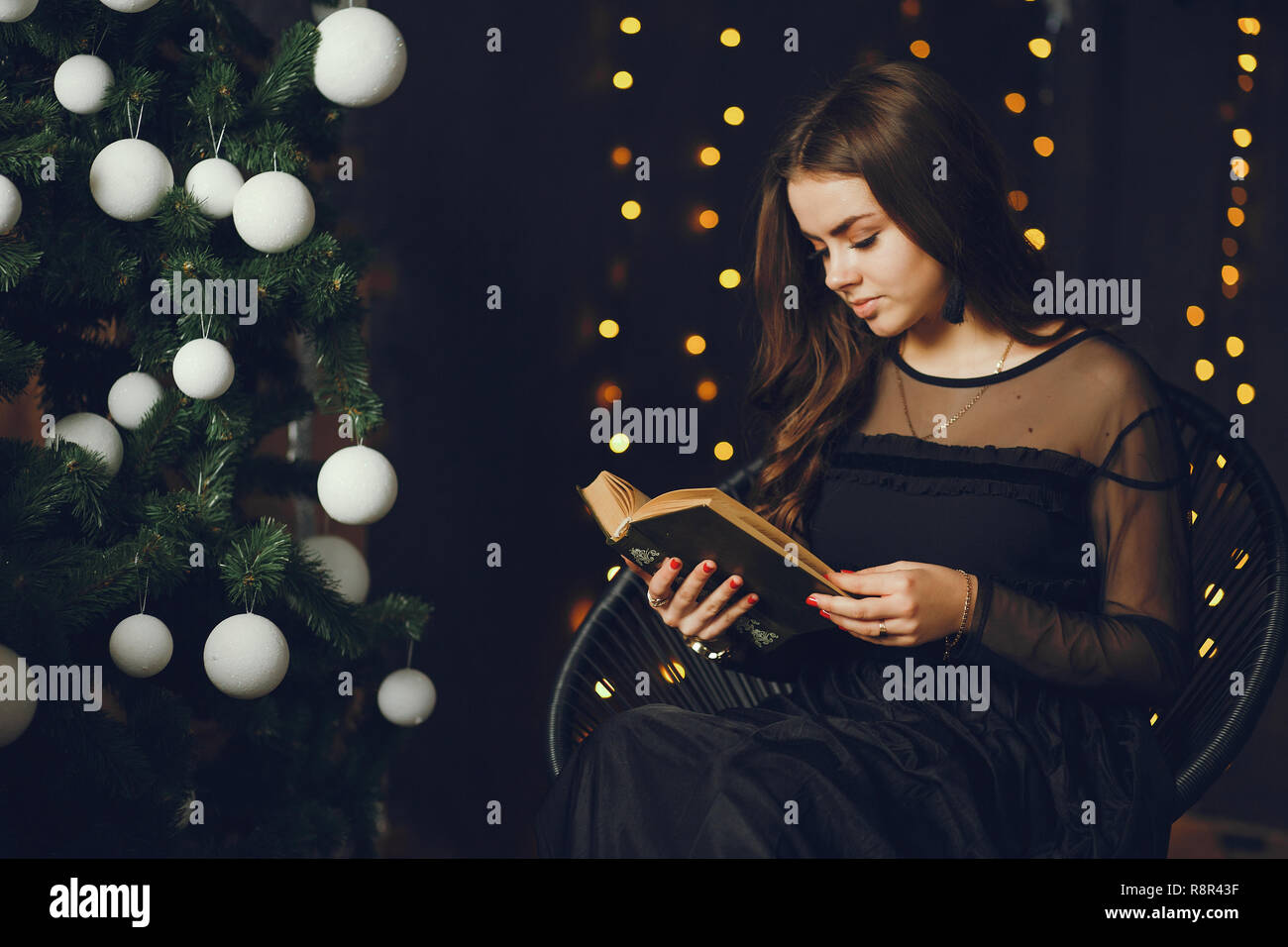 Beautiful girl reading a book Stock Photo - Alamy