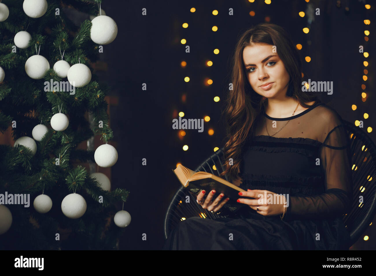 Beautiful girl reading a book Stock Photo - Alamy