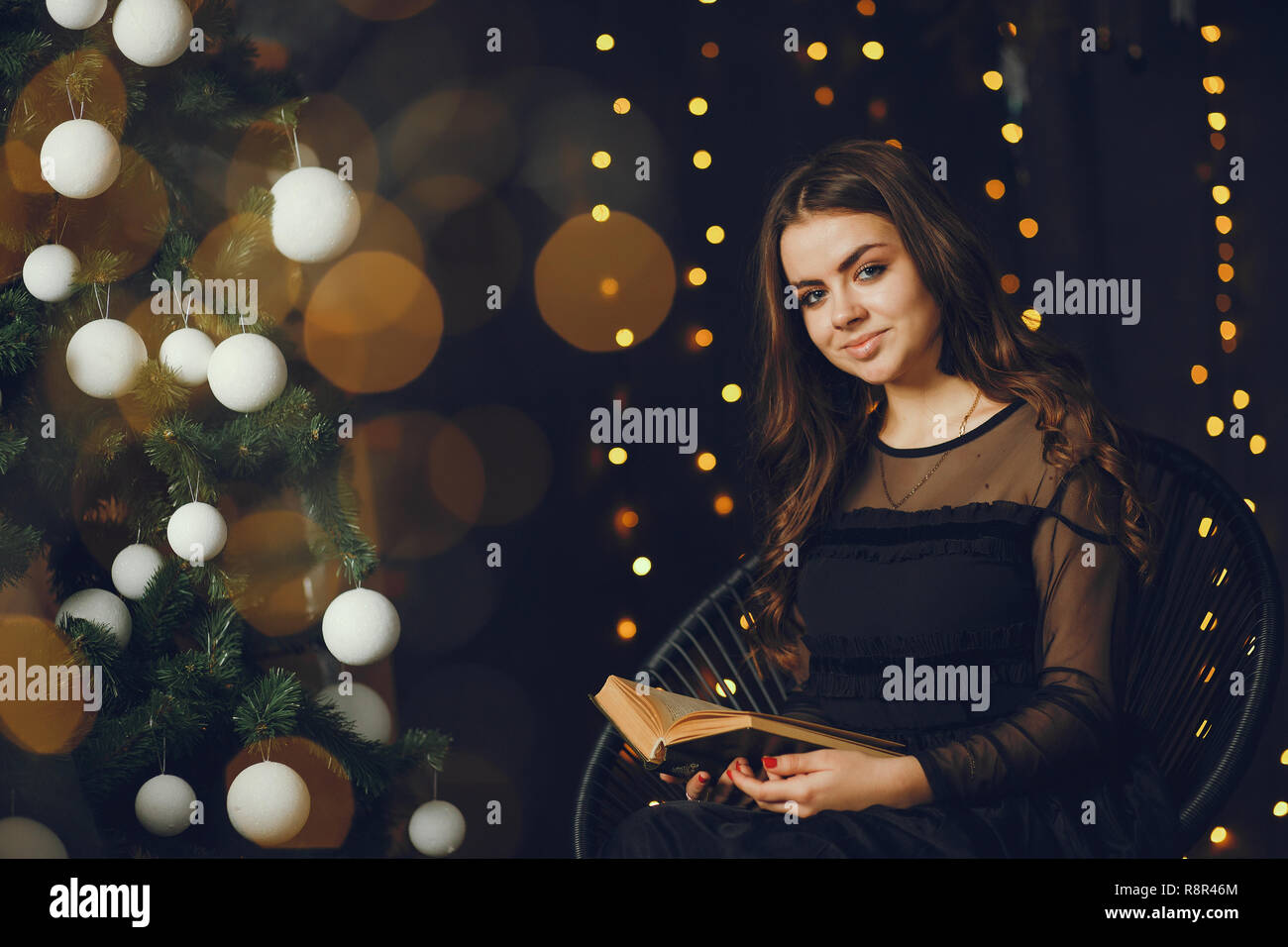 Beautiful girl reading a book Stock Photo - Alamy