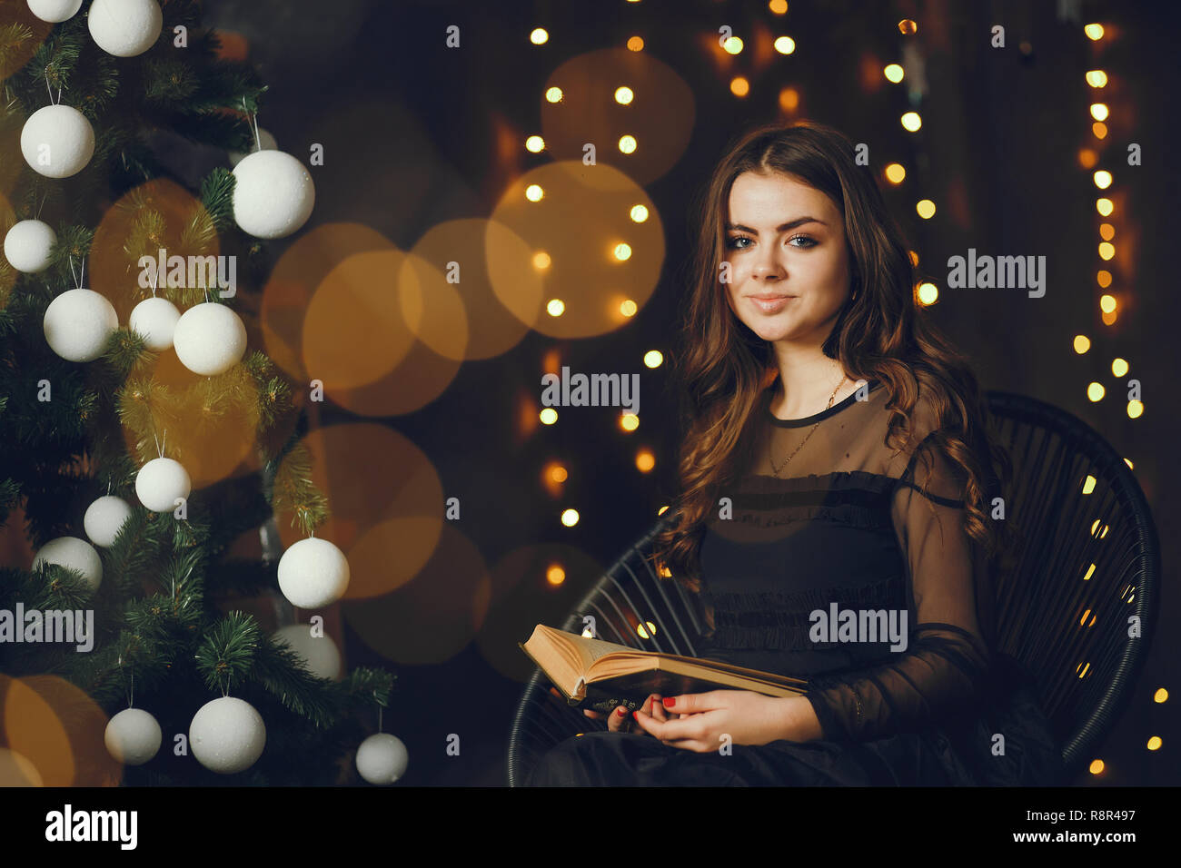 Beautiful girl reading a book Stock Photo - Alamy