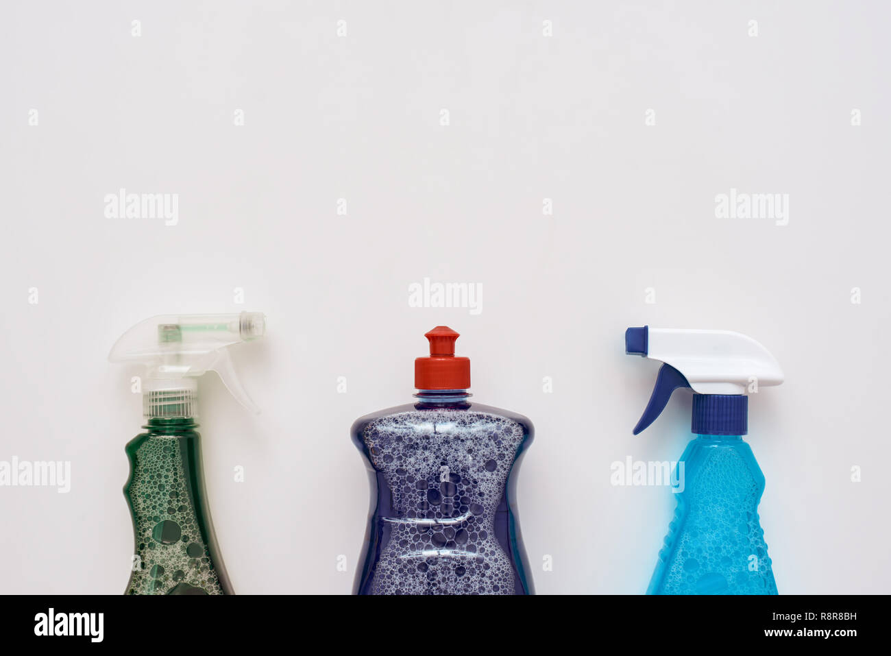 Cleaning tools. Spray bottles and cleanser isolated Stock Photo - Alamy