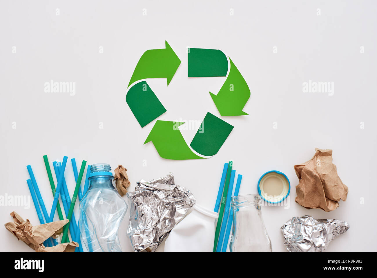 Garbage sorting saves the world. Crumple foil, paper and plastic Stock ...
