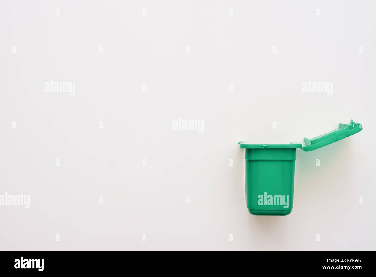 Recycling bio bin isolated. Green trash can isolated at white ...