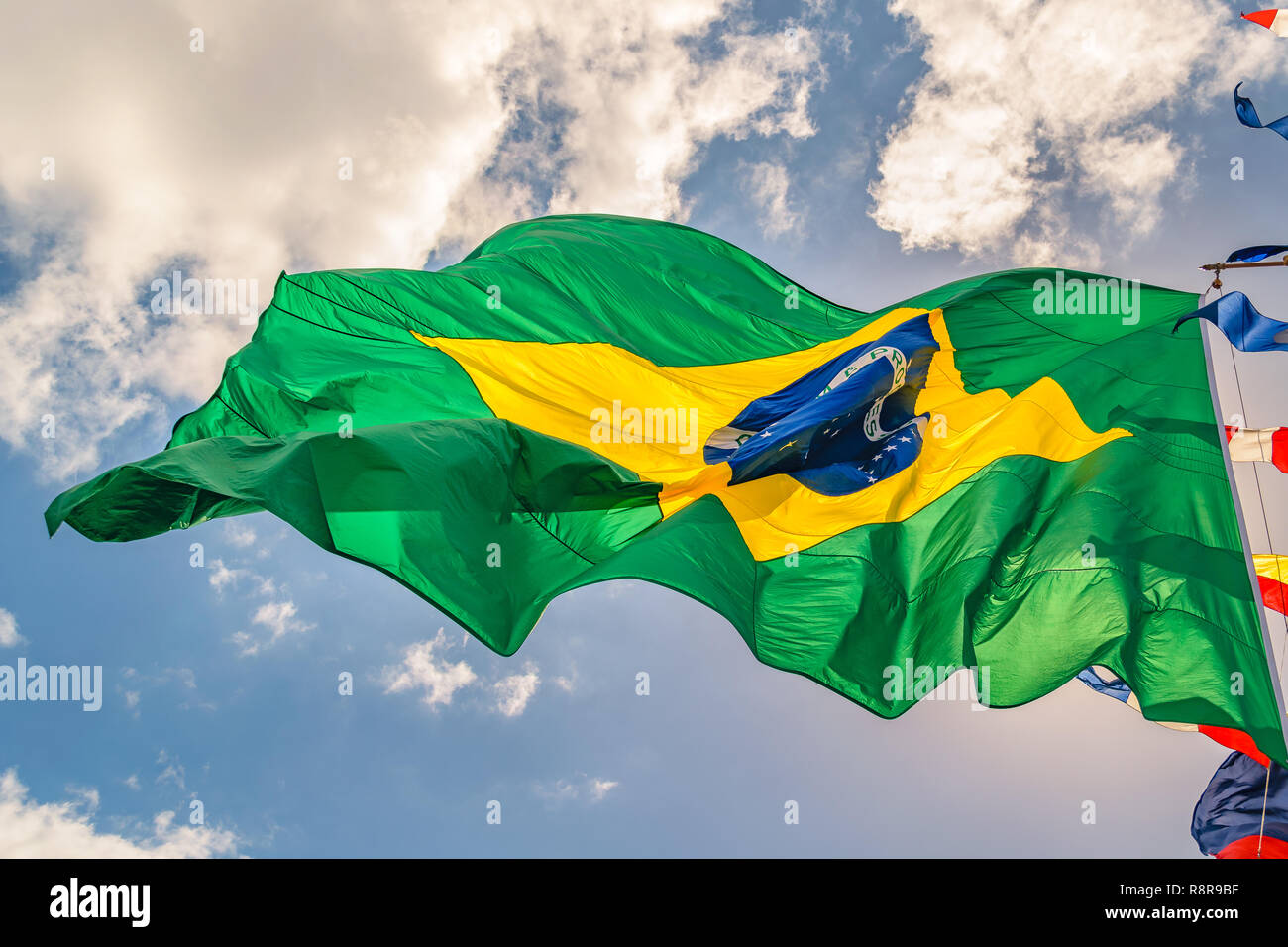 Blue sky background with brazil flag hi-res stock photography and ...