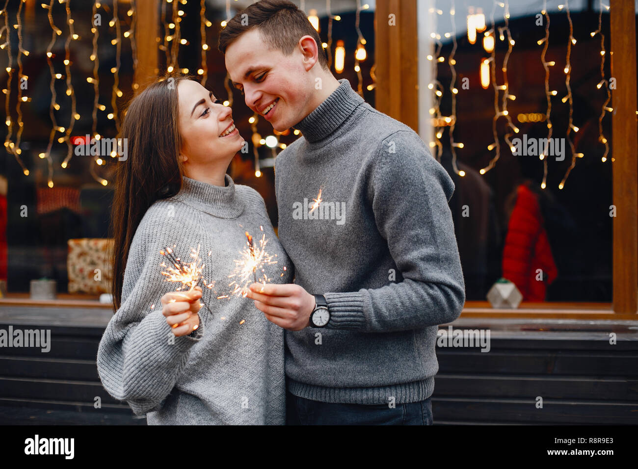 couple near windows Stock Photo - Alamy