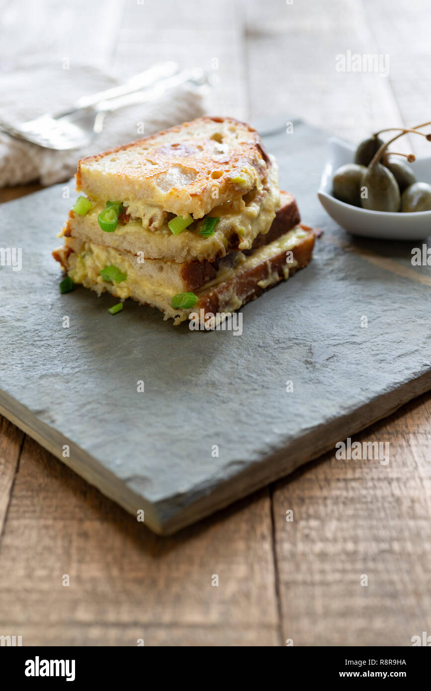 Sourdough cheese and spring onion toasted sandwich - toastie Stock Photo - Alamy