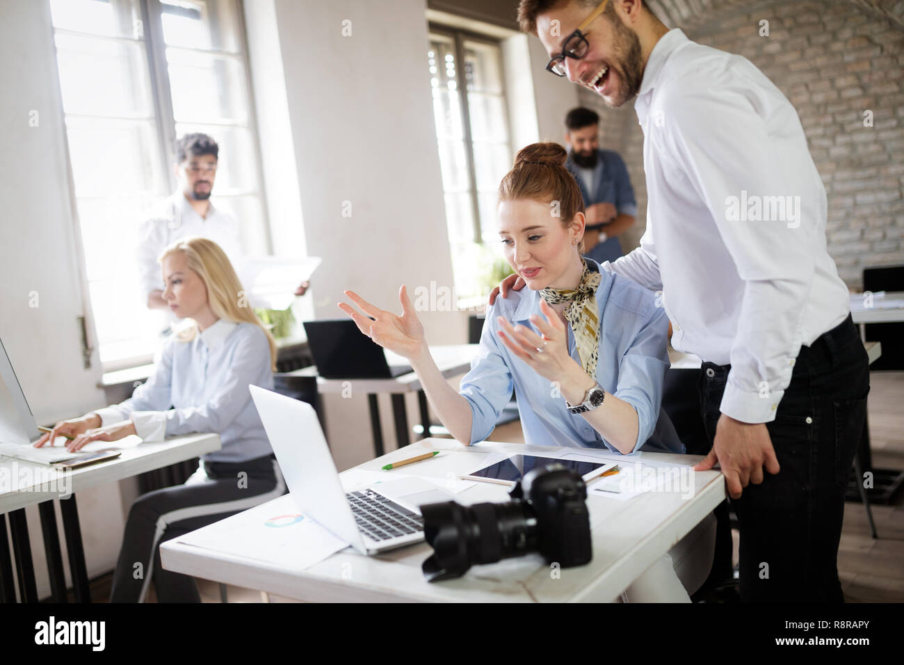 Successful happy group of people learning software engineering and ...