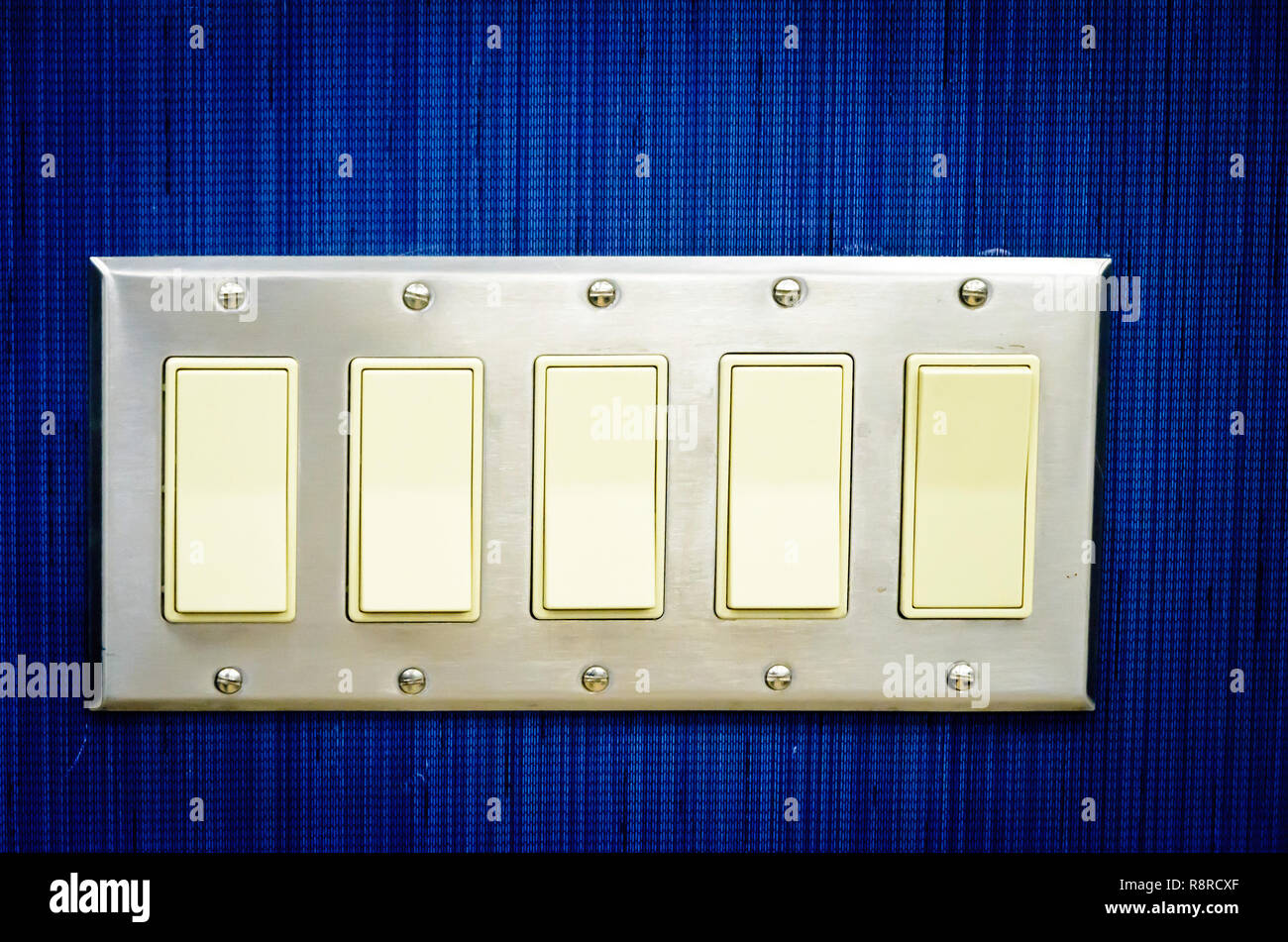 110/120 light switches in a commercial setting Stock Photo - Alamy