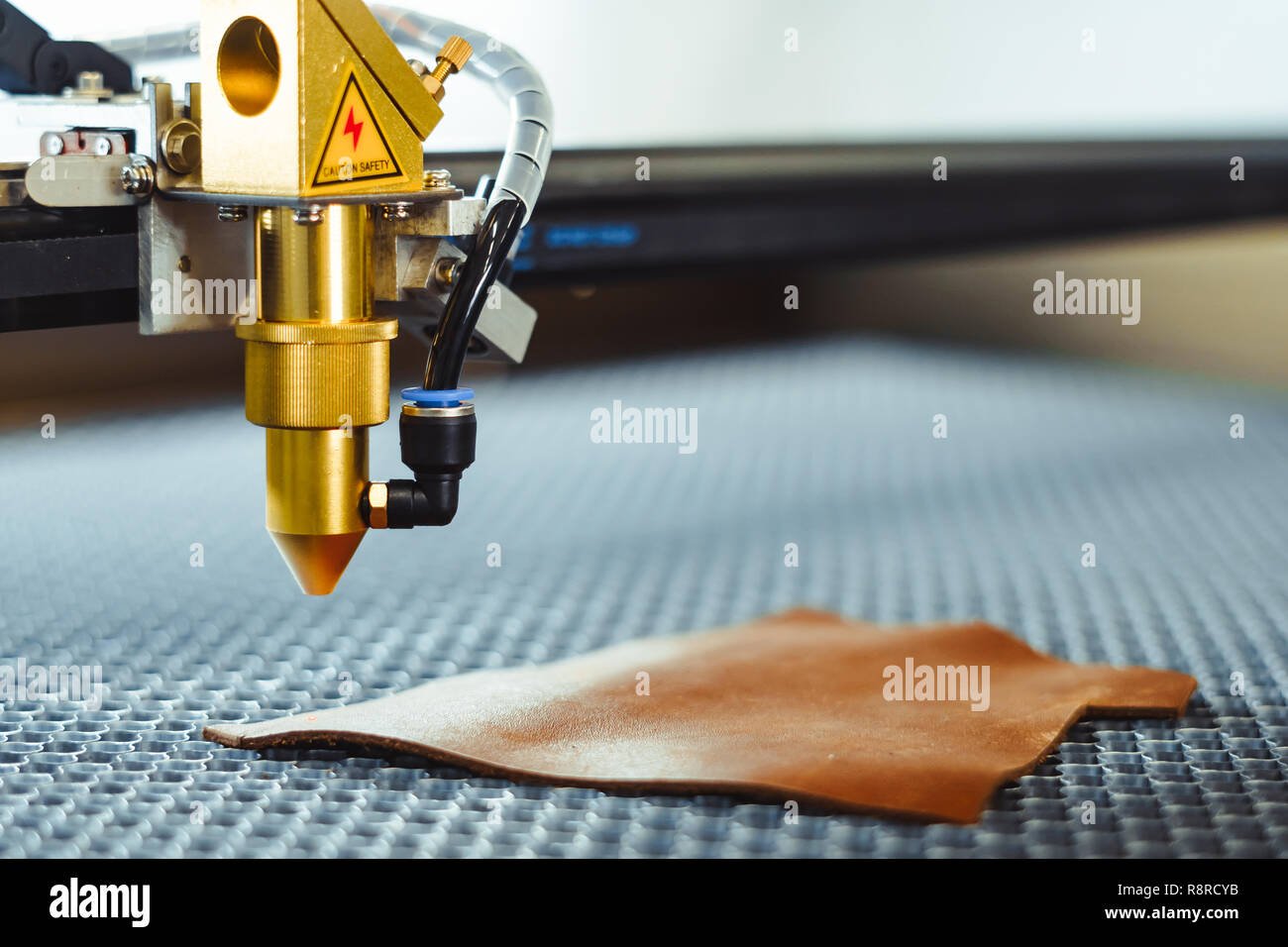 Very fine CNC leather cutting router machine Stock Photo - Alamy