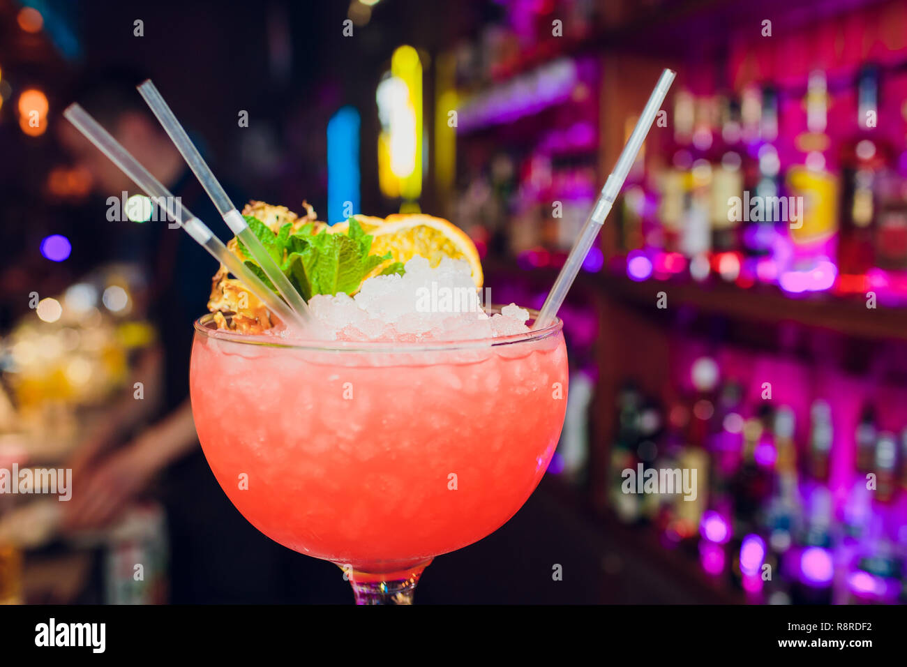 Glasses cocktails bar background Stock Photo - Alamy