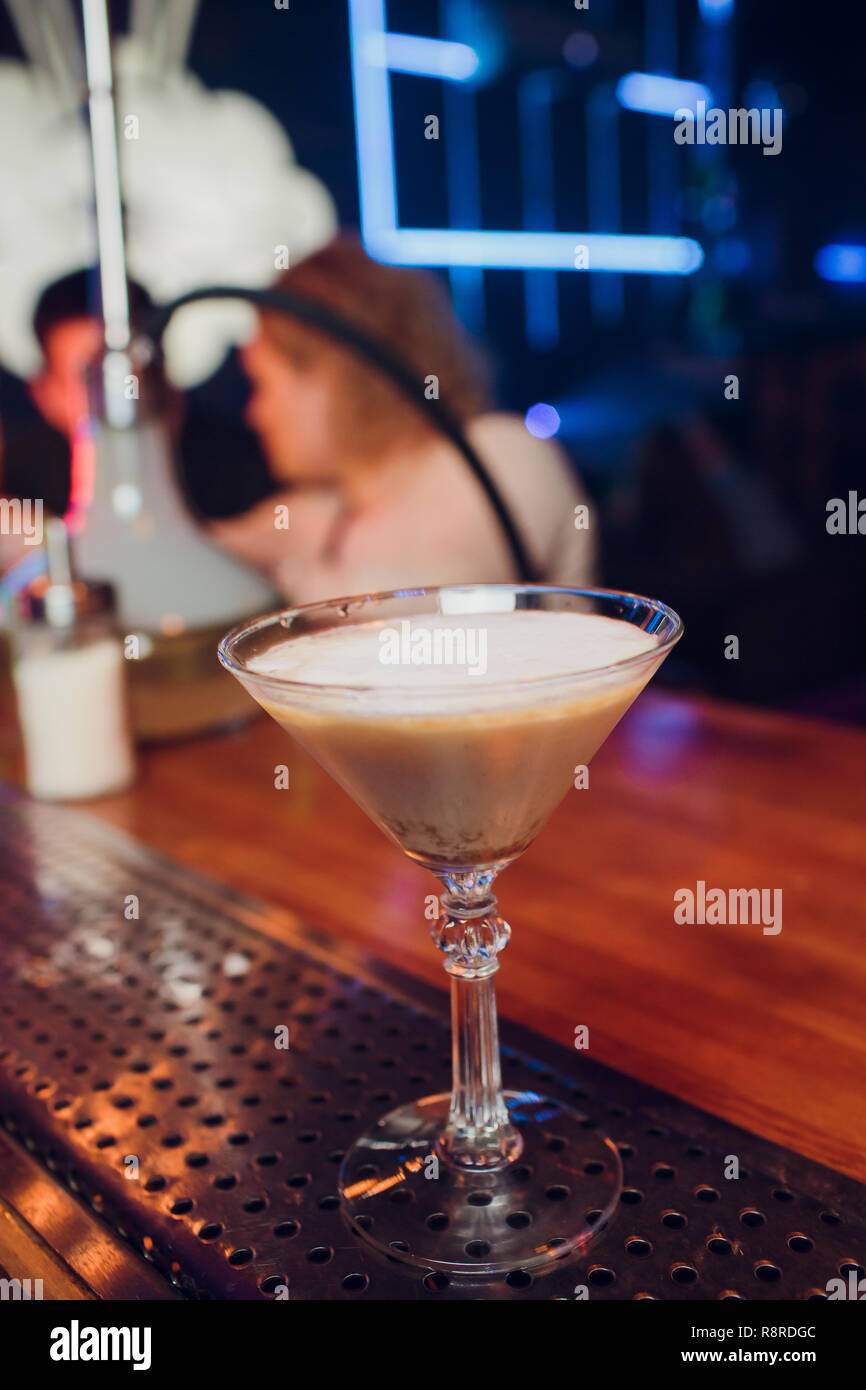 Glasses cocktails bar background Stock Photo - Alamy