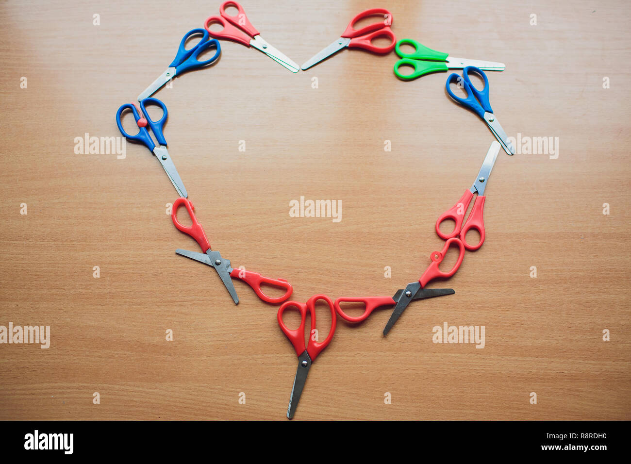 Broken red heart cut by scissor, love on Valentine's day, love ...