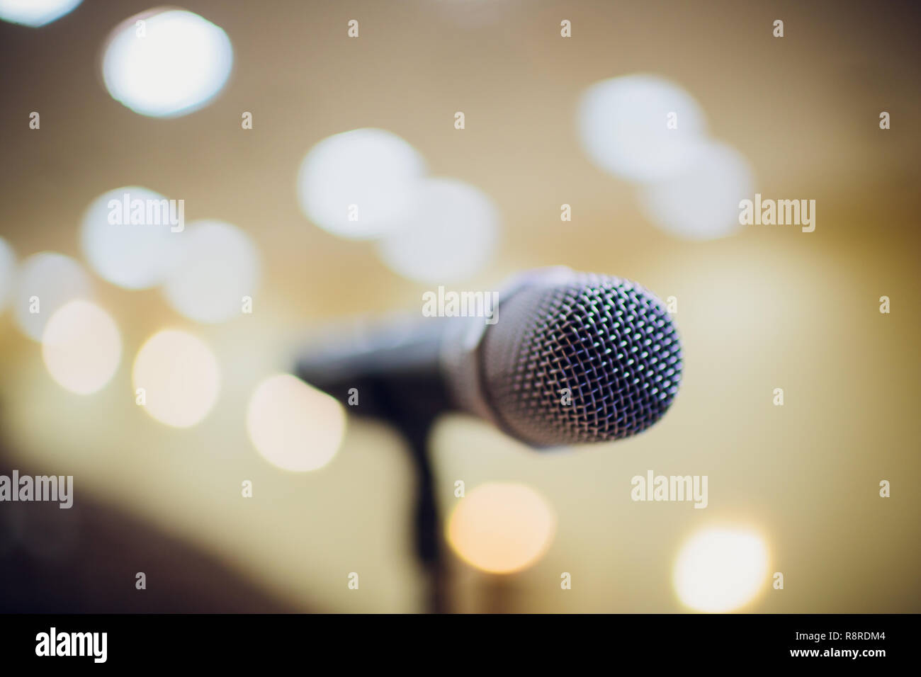 microphone on stand up comedy stage with reflectors ray, high contrast ...