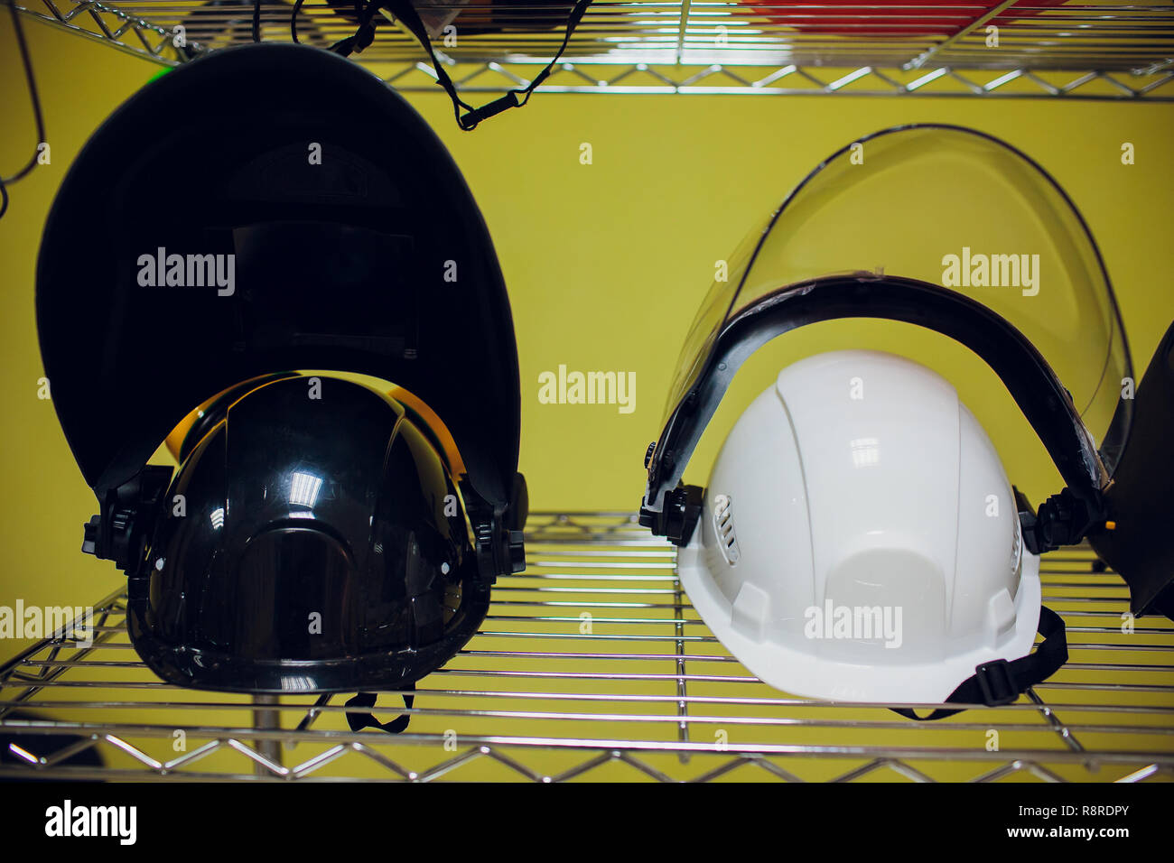 used and old Safety Helmets Head Protection Stock Photo - Alamy