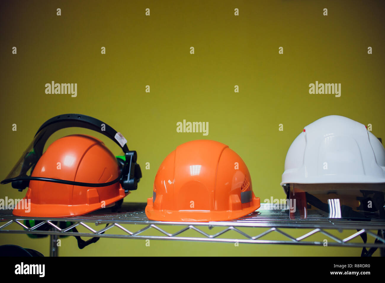 used and old Safety Helmets Head Protection Stock Photo - Alamy