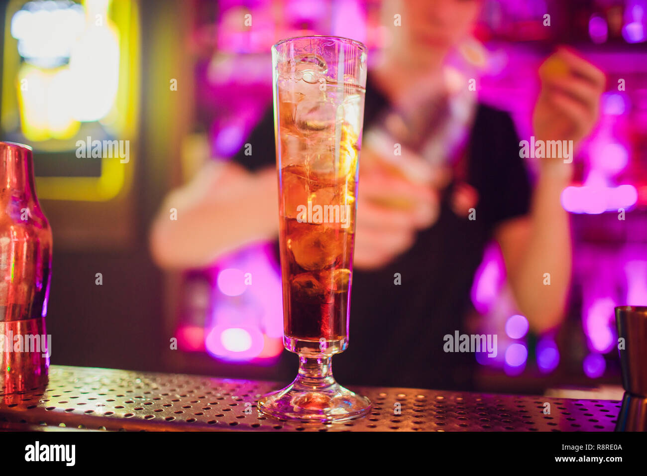 Glasses alcohol color cocktails on bar background Stock Photo - Alamy