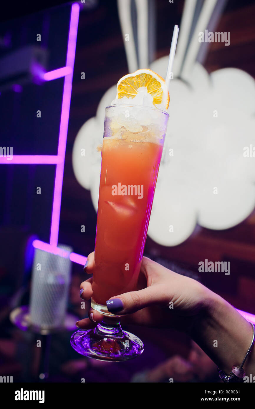 Glasses alcohol color cocktails on bar background Stock Photo - Alamy