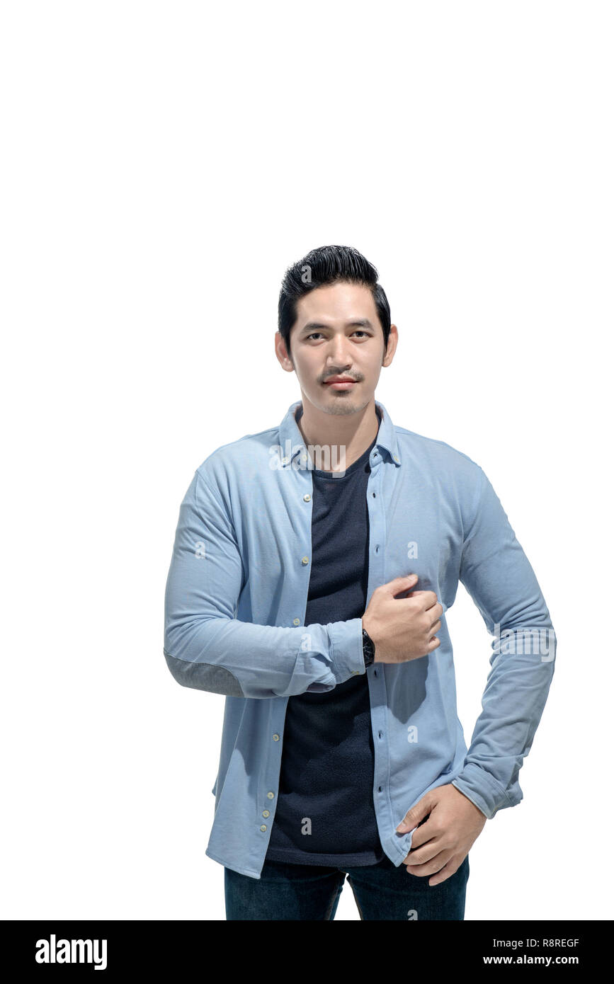 Romantic asian man with blue shirt standing isolated over white ...