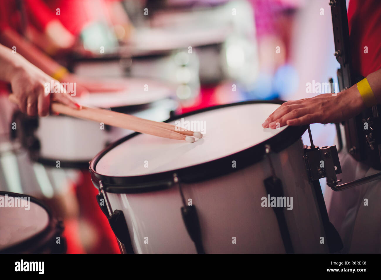 drummer plays with drumsticks on rock drum set Stock Photo - Alamy