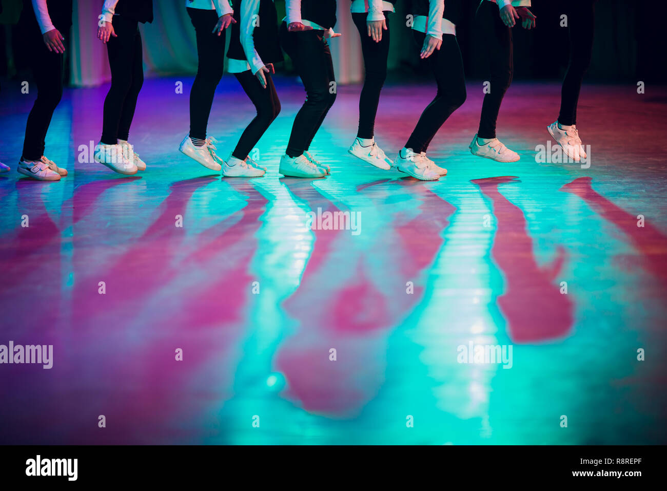 Legs of dancing people party Stock Photo - Alamy