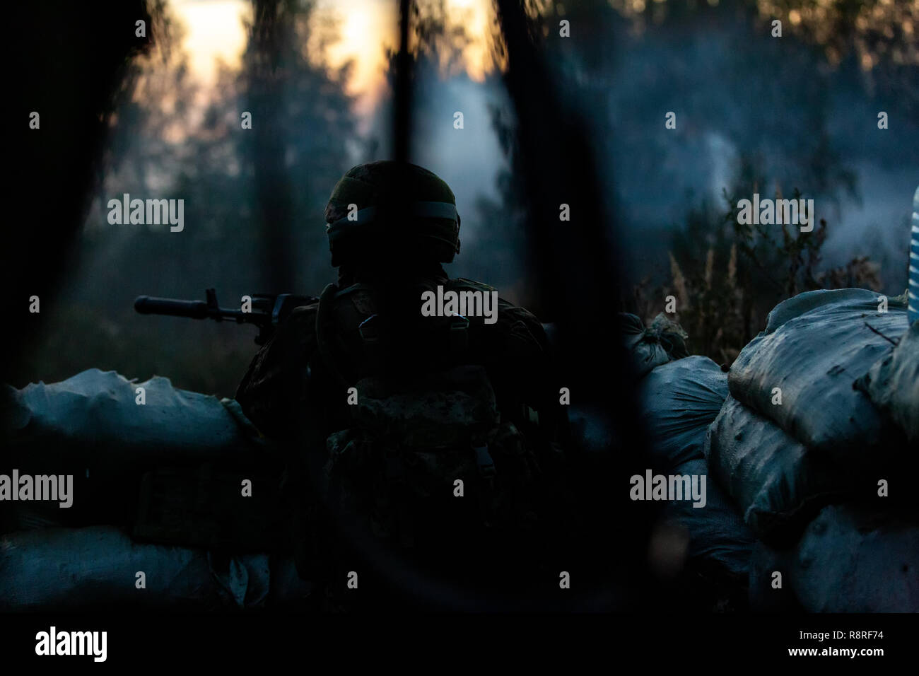 Sniper armed with large caliber, sniper rifle, shooting enemy targets ... Sniper armed with large caliber, sniper rifle, shooting enemy targets ...