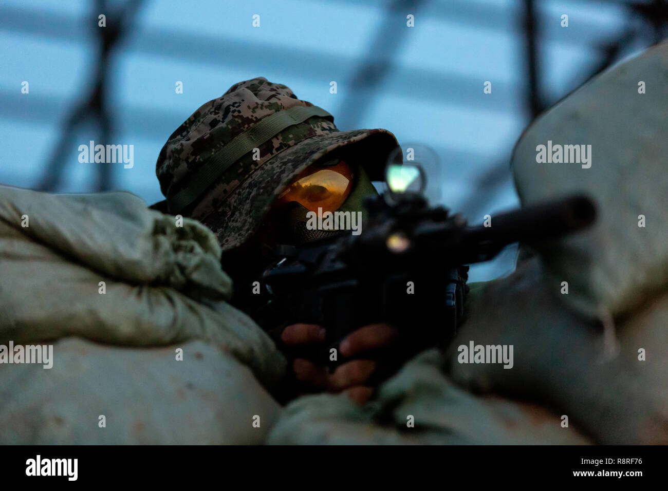 Sniper armed with large caliber, sniper rifle, shooting enemy targets ...