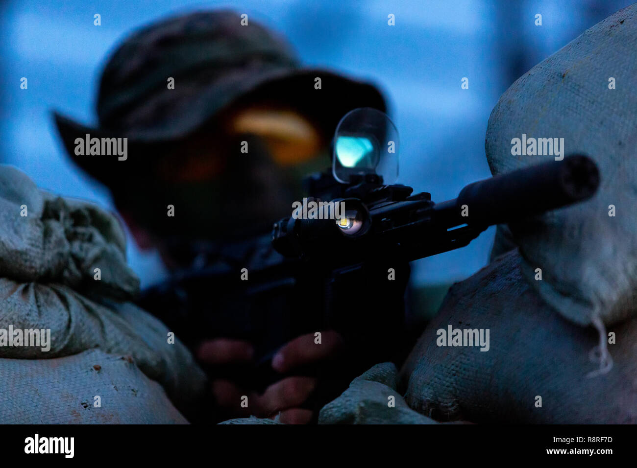 Sniper armed with large caliber, sniper rifle, shooting enemy targets ...