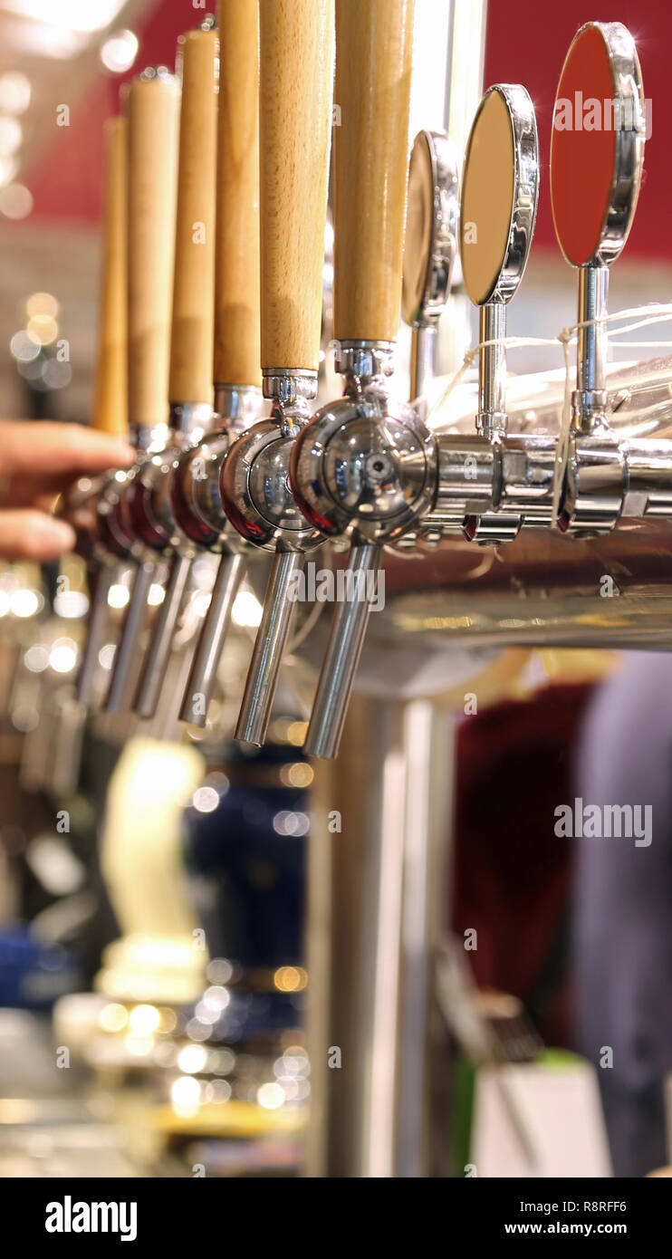 pub taps to deliver beer to customers Stock Photo - Alamy