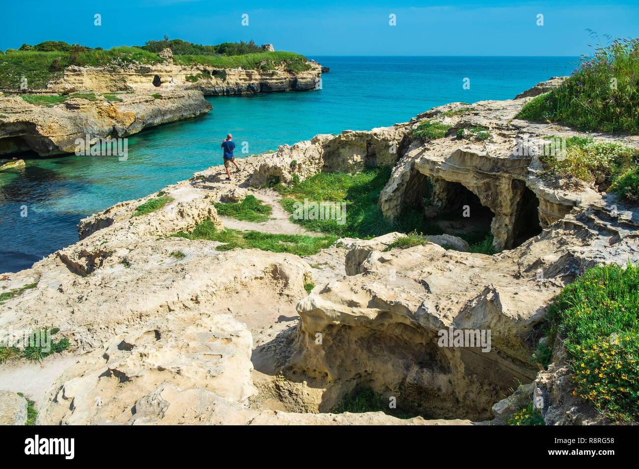 Italy, Apulia, Salento region, Roca Vecchia, jagged coastline dotted ...