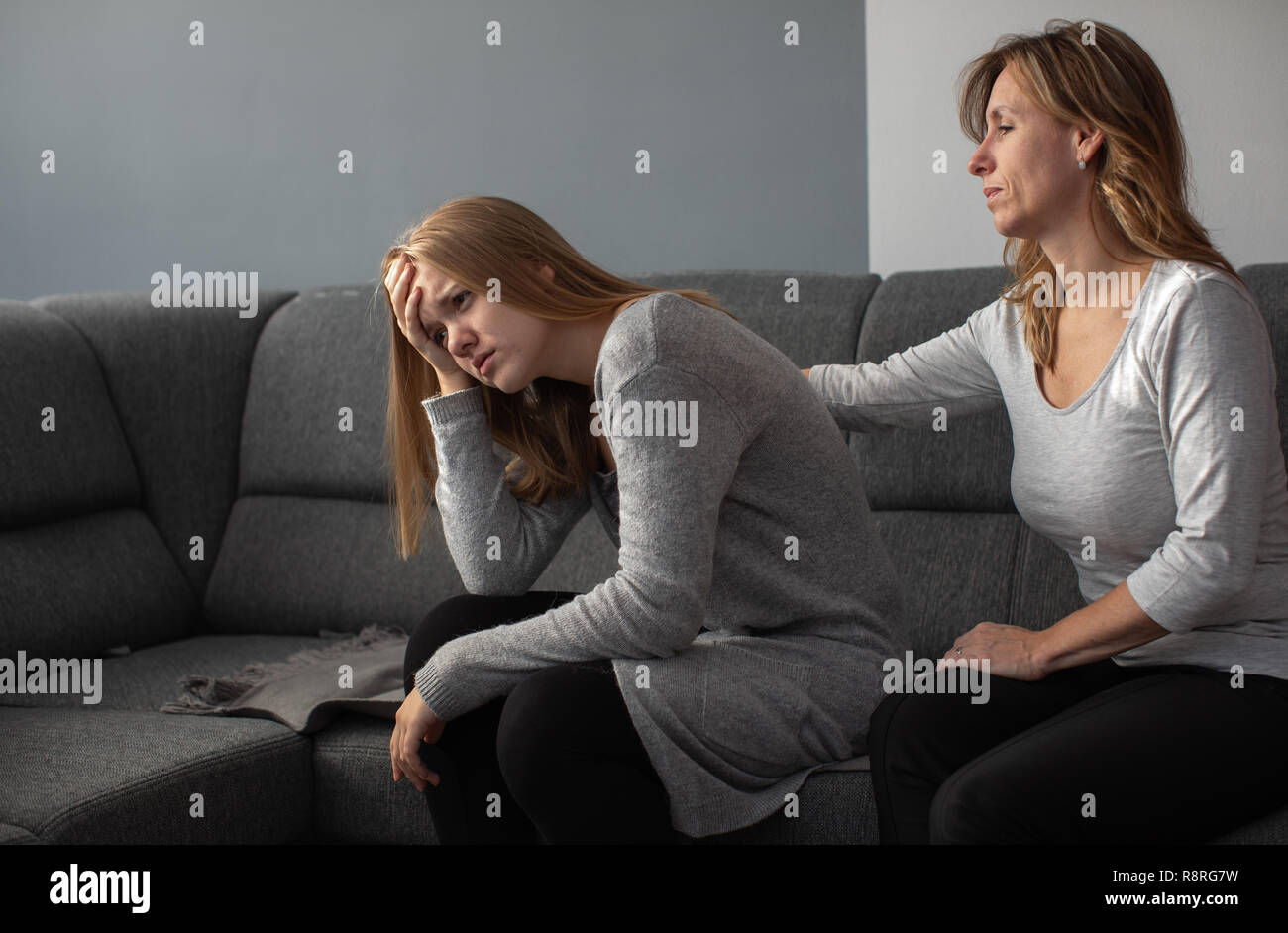 Stressed teenager and parent hi-res stock photography and images - Alamy