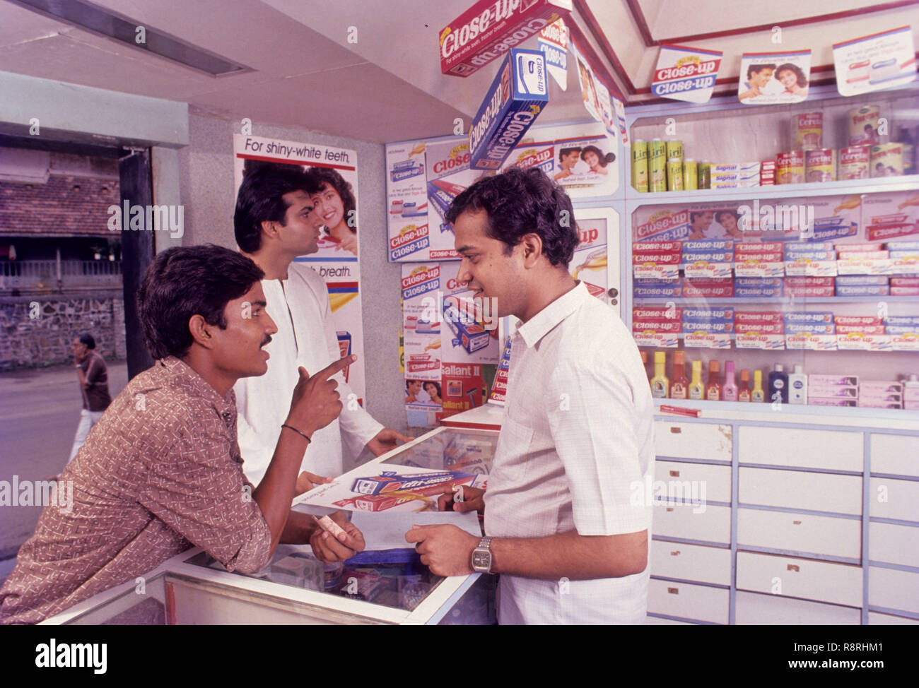 Retail Marketing Shop, Salesman and Customers, India Stock Photo - Alamy