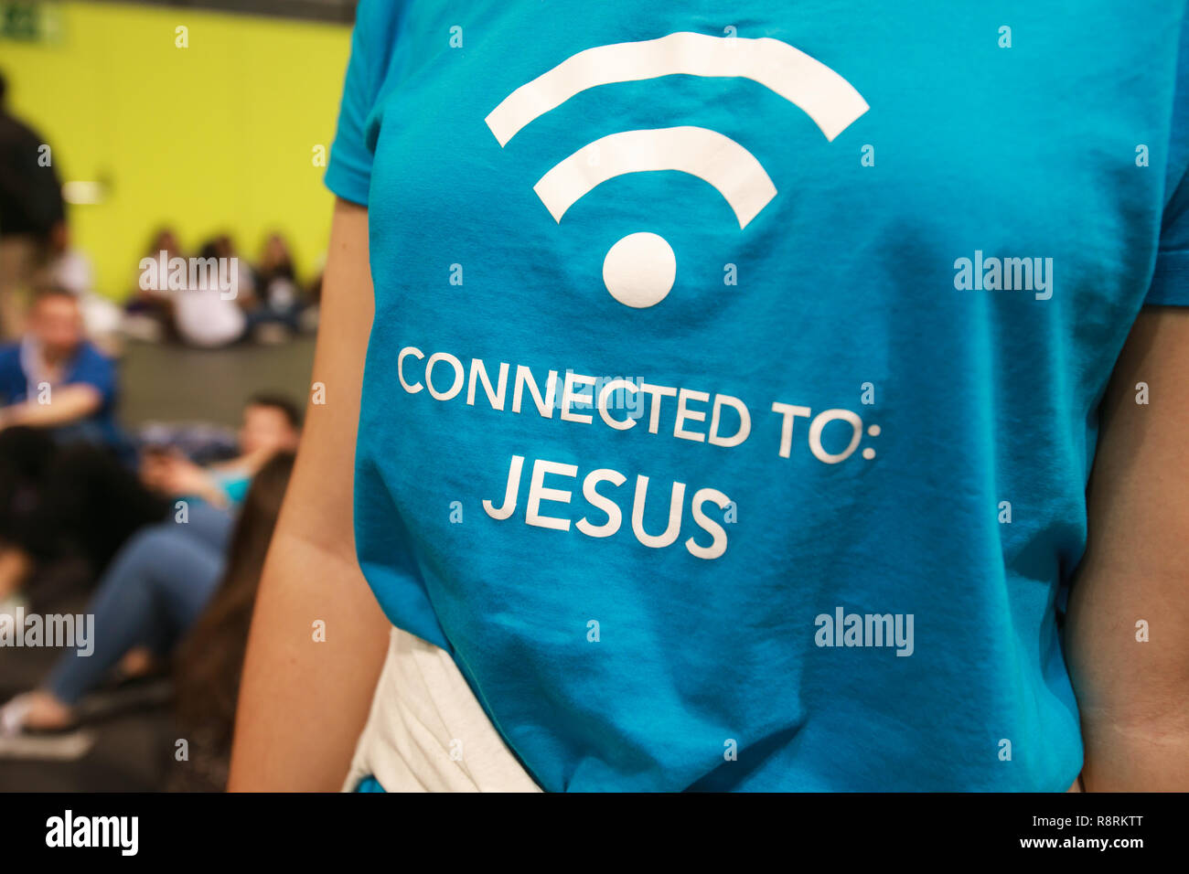 Connected to Jesus written on t-shirt Stock Photo - Alamy