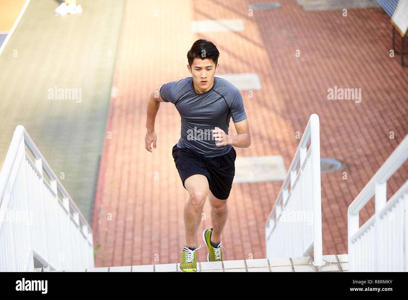 Running male young hi-res stock photography and images - Alamy