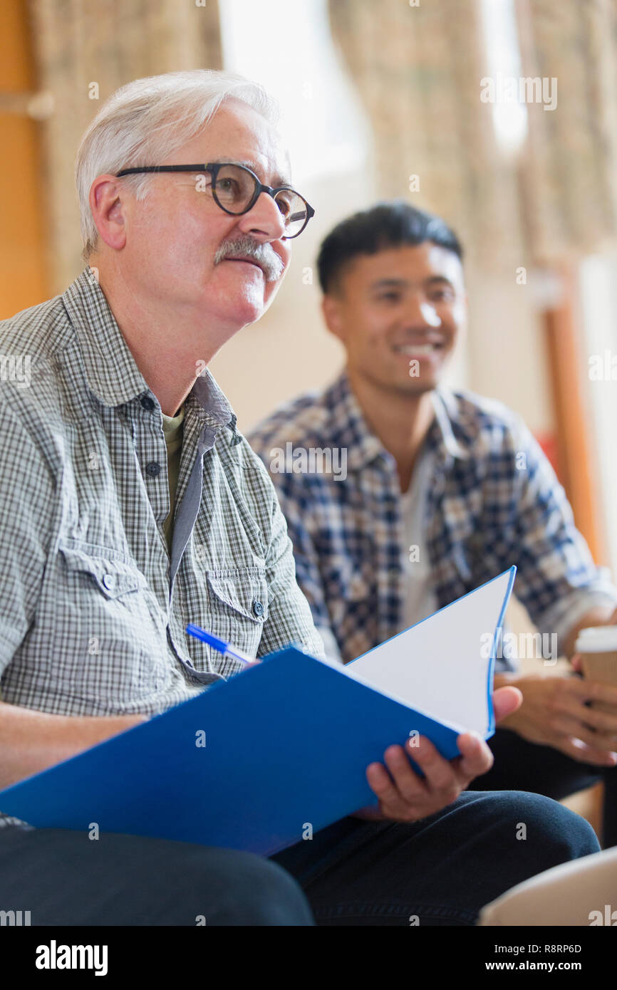 Taking notes on group of people hi-res stock photography and images - Alamy