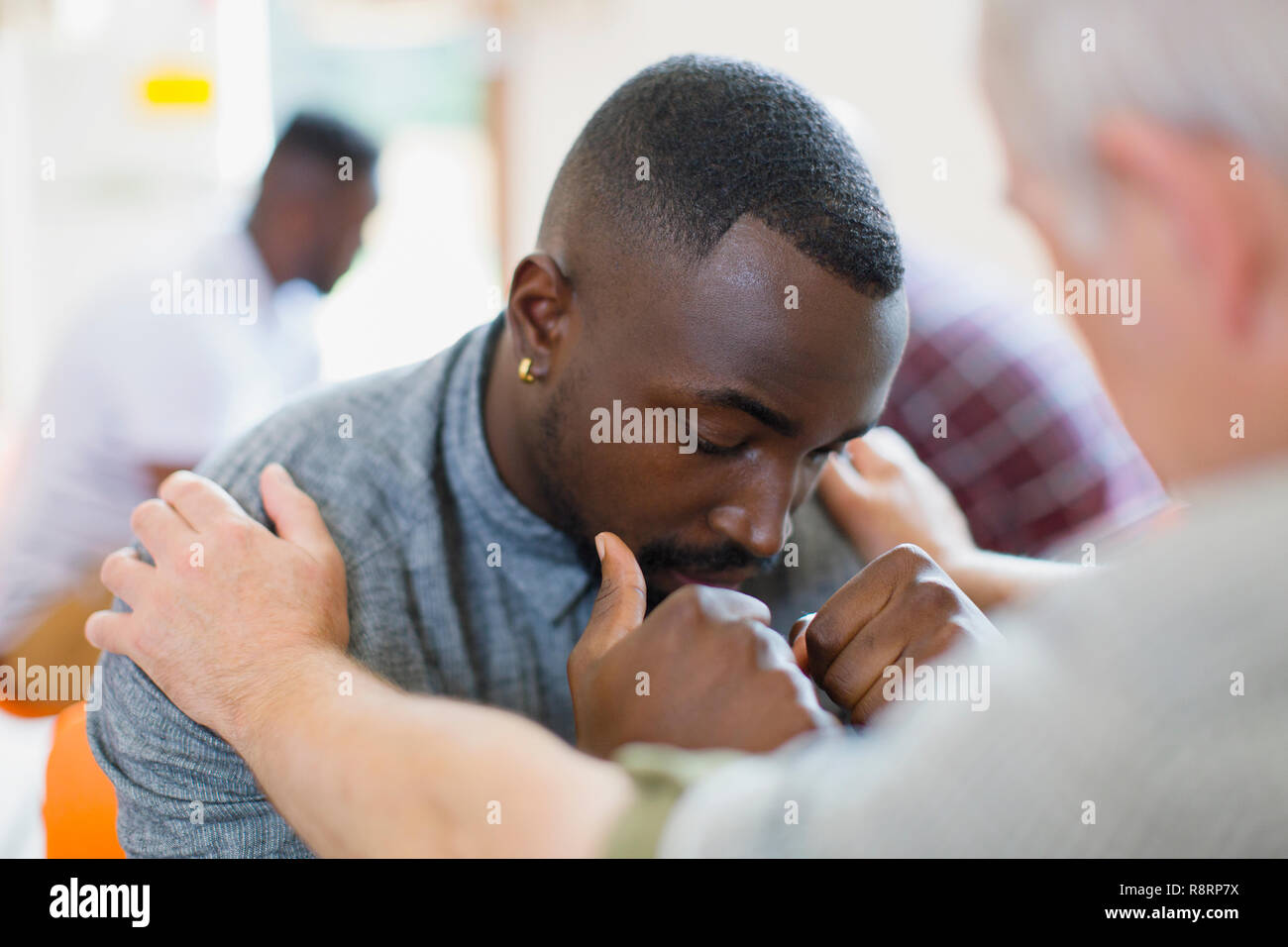 Grief comforting hi-res stock photography and images - Alamy