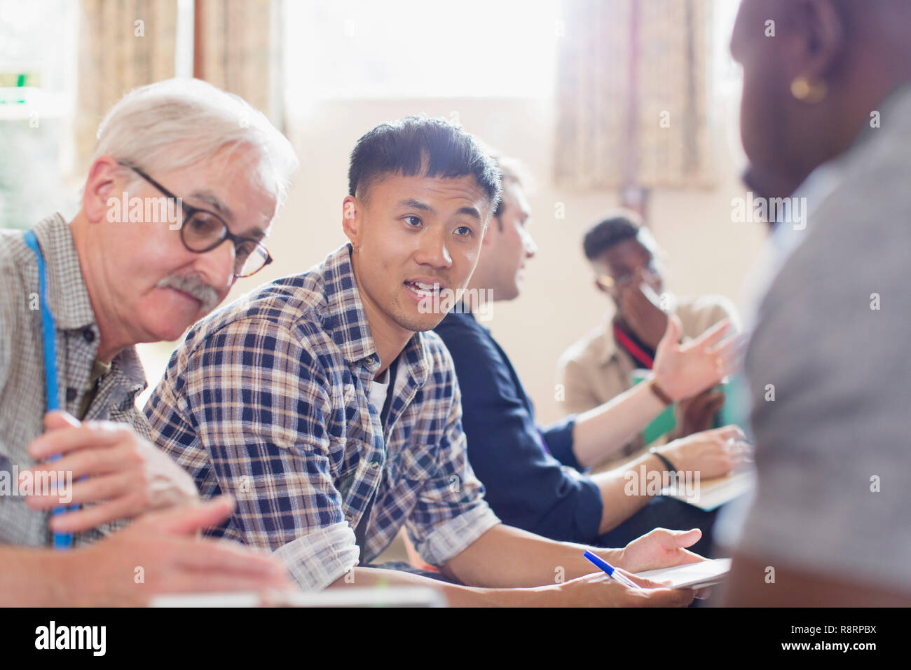 Men talking therapy hi-res stock photography and images - Alamy