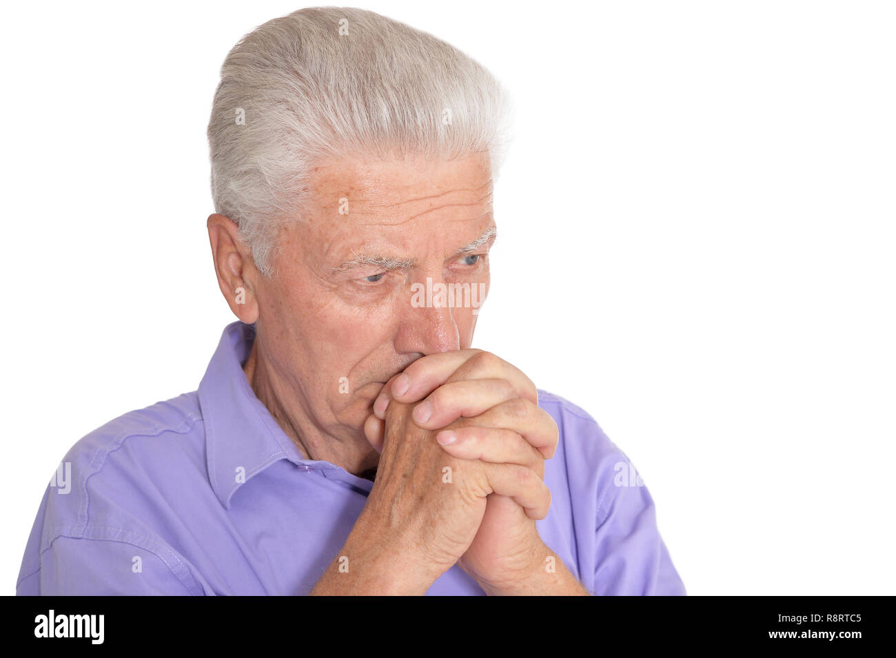 Thinking senior man isolated on white background Stock Photo - Alamy