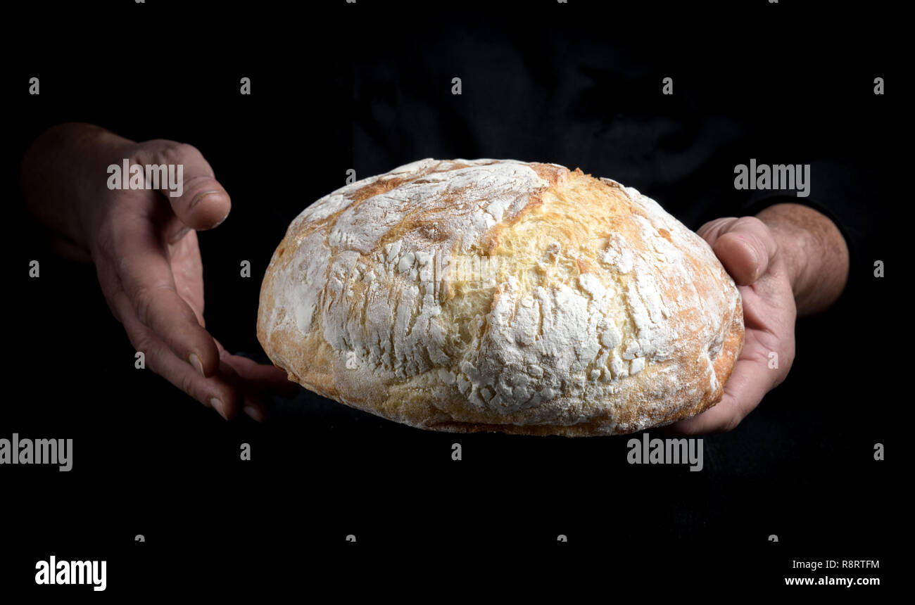 Black male with a loaf of bread hi-res stock photography and images - Alamy