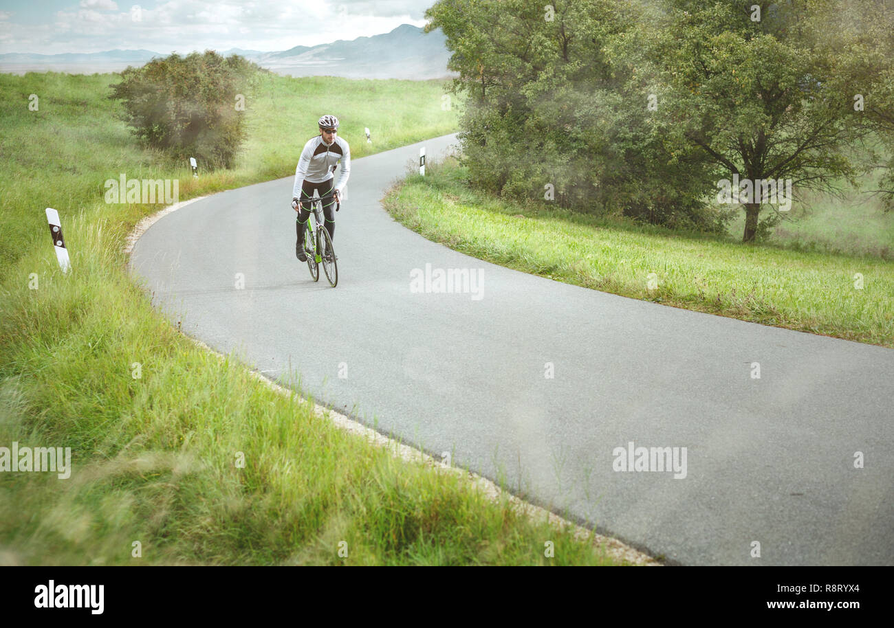 Small cyclist hi-res stock photography and images - Alamy