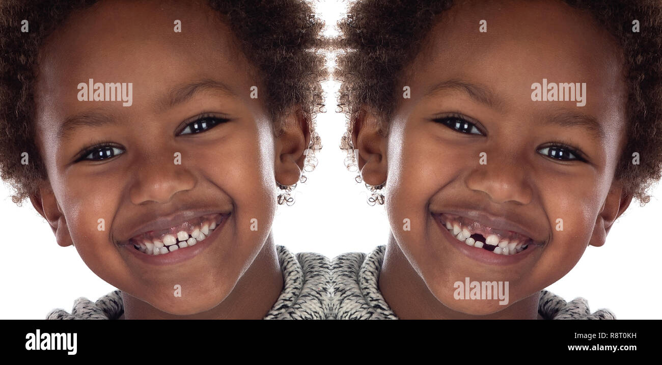 Two happy children with and without teeth laughing and looking at ...